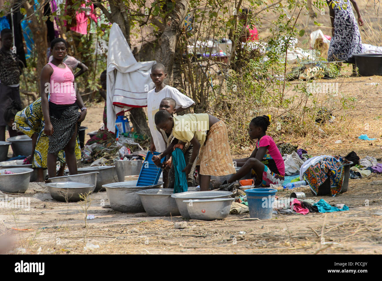 TECHIMAN, GHANA - JAN 15, 2017: Unidentified Ghanaian people clean the ...