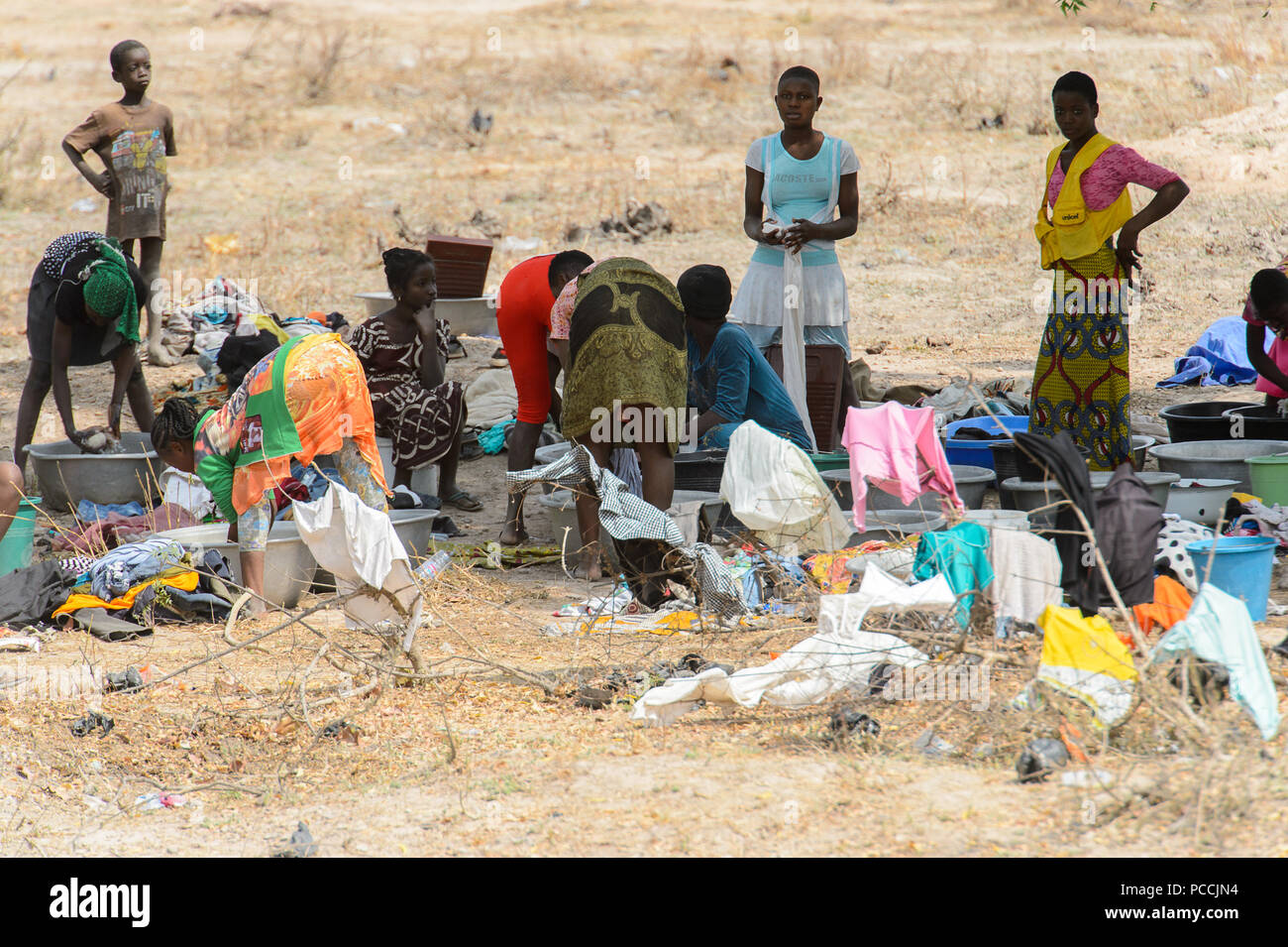 TECHIMAN, GHANA - JAN 15, 2017: Unidentified Ghanaian people clean the ...