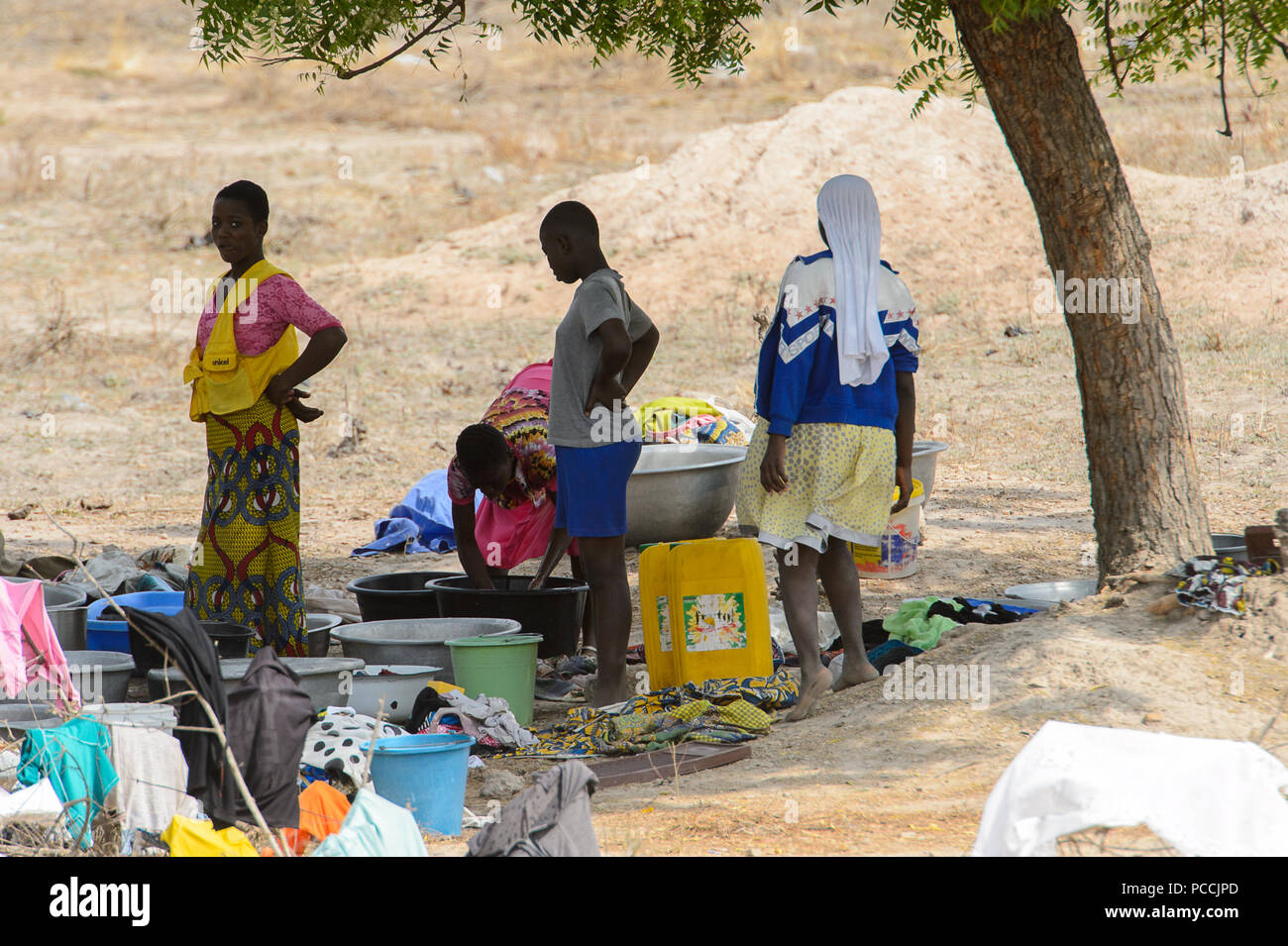 TECHIMAN, GHANA - JAN 15, 2017: Unidentified Ghanaian people clean the ...