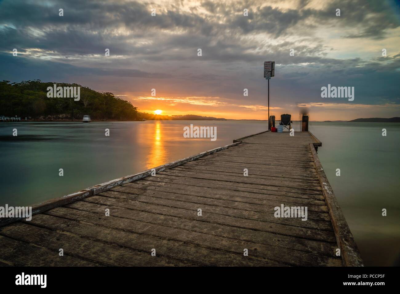 Stunning sunset from Little beach pier in Port Stephens Stock Photo - Alamy