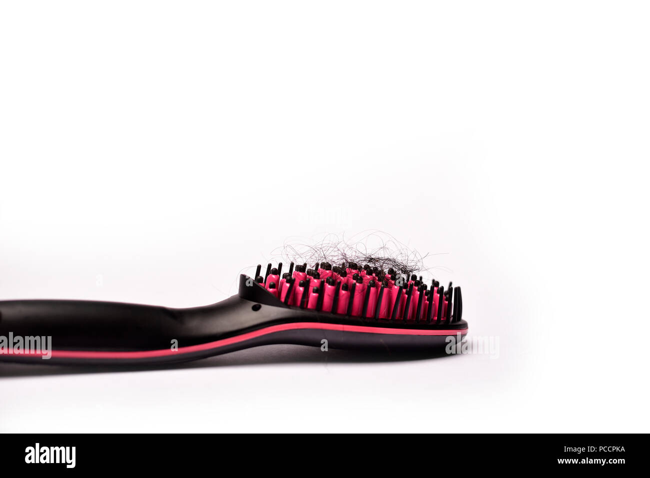 Comb hair on a white background Stock Photo - Alamy