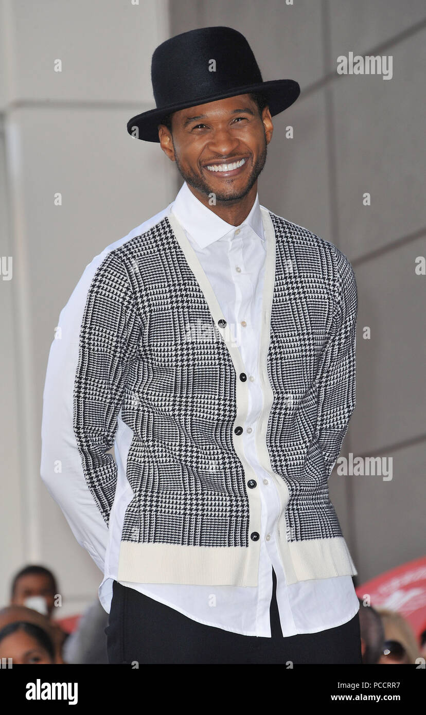 Usher at the star for Kenny Babyface Edmonds on the Hollywood Walk Of ...