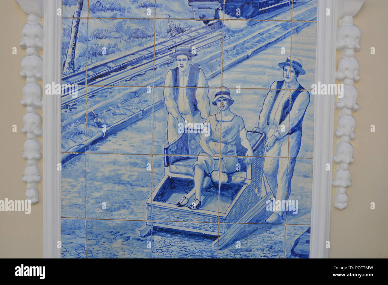 Azuelos, painted blue & white traditional tiles on an exterior wall of ...