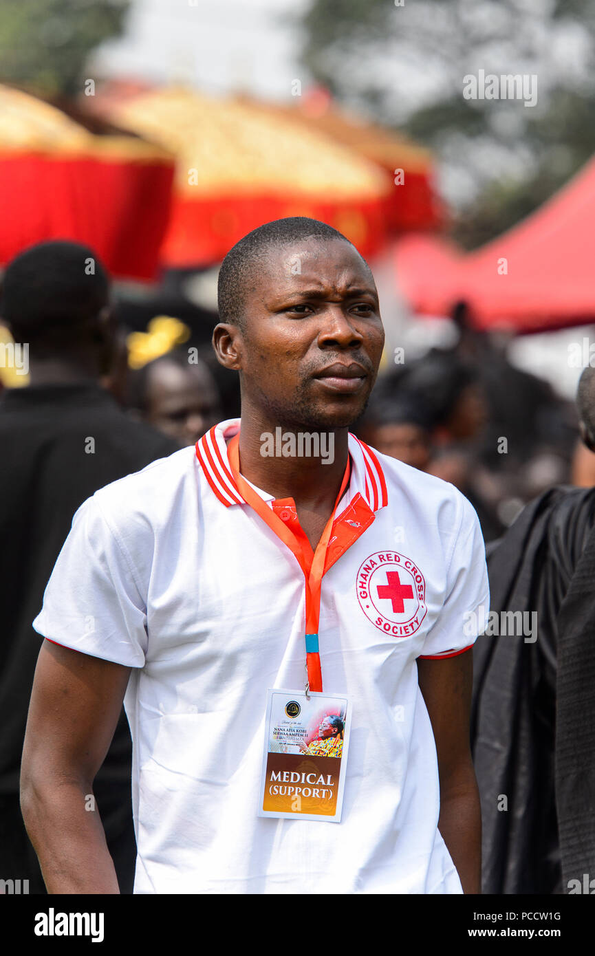 KUMASI, GHANA - JAN 16, 2017: Unidentified Ghanaian man in a Red cross ...
