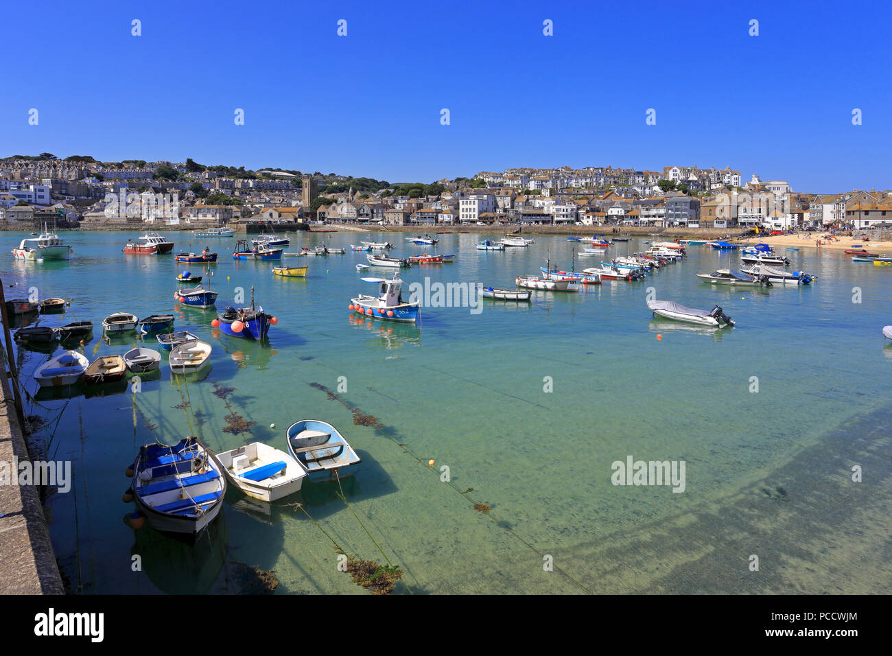 Fishing boats in St Ives harbour, Cornwall, England, UK Stock Photo - Alamy