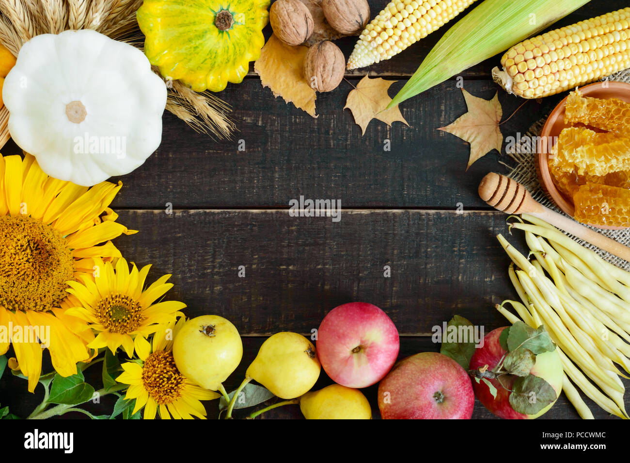 Autumnal food background. Crop of vegetables and fruit on wooden ...