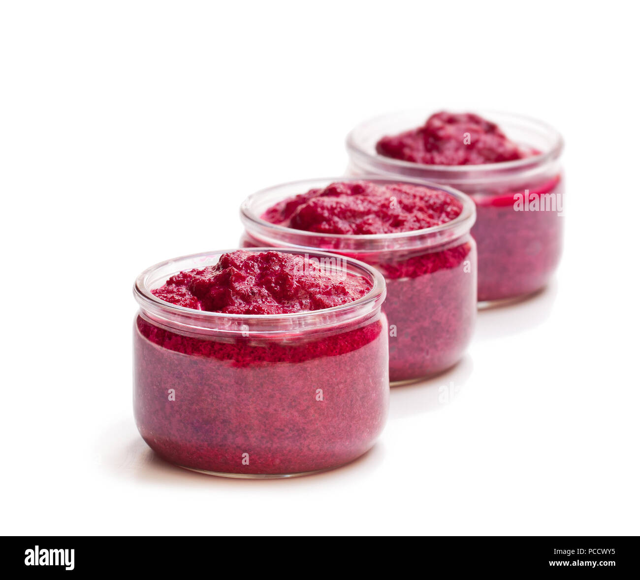 Beetroot puree in glass jars isolated on white Stock Photo - Alamy