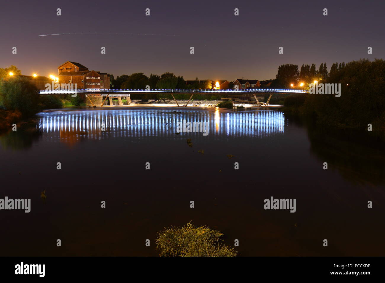 The Millennium Bridge over the River Aire in Castleford at night Stock ...