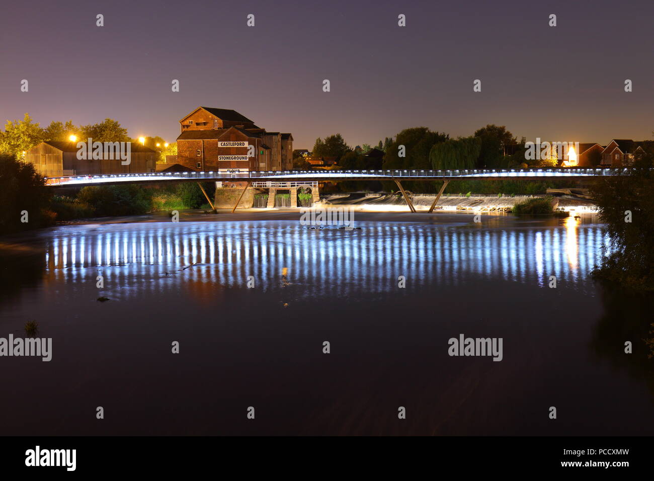 The Millennium Bridge over the River Aire in Castleford at night Stock ...