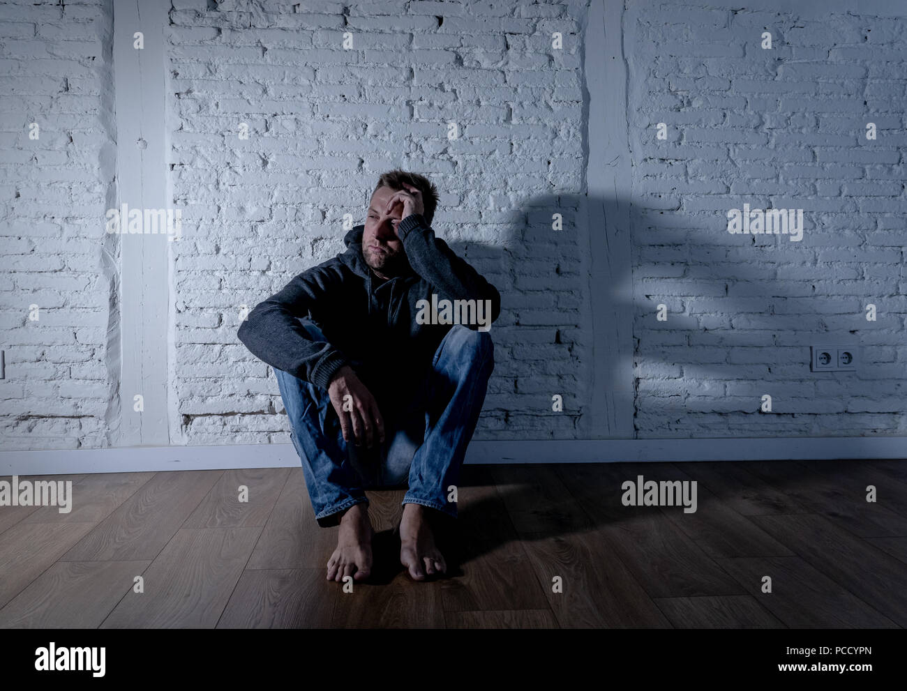 Young devastated depressed woman crying sad feeling hurt suffering ...