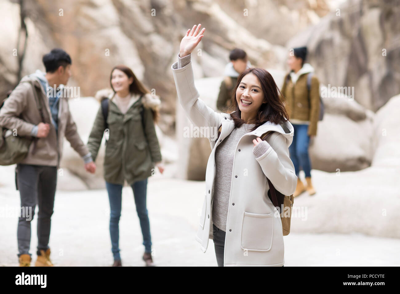 Happy young Chinese friends enjoying winter outing Stock Photo - Alamy