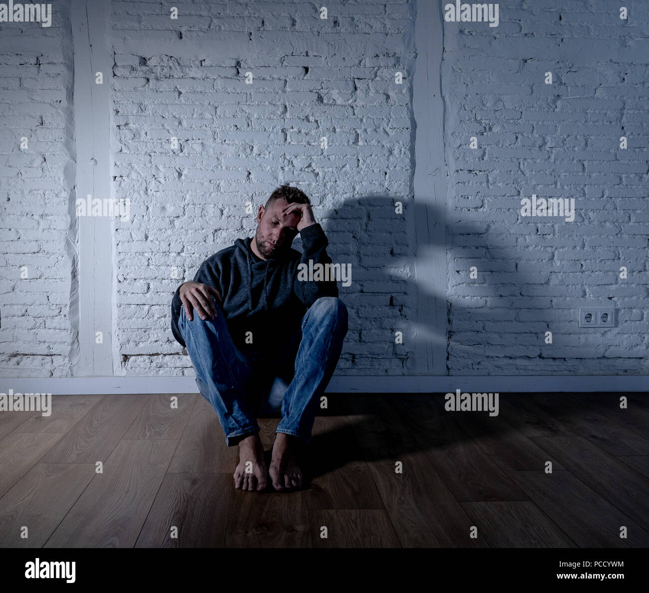 Young devastated depressed woman crying sad feeling hurt suffering ...