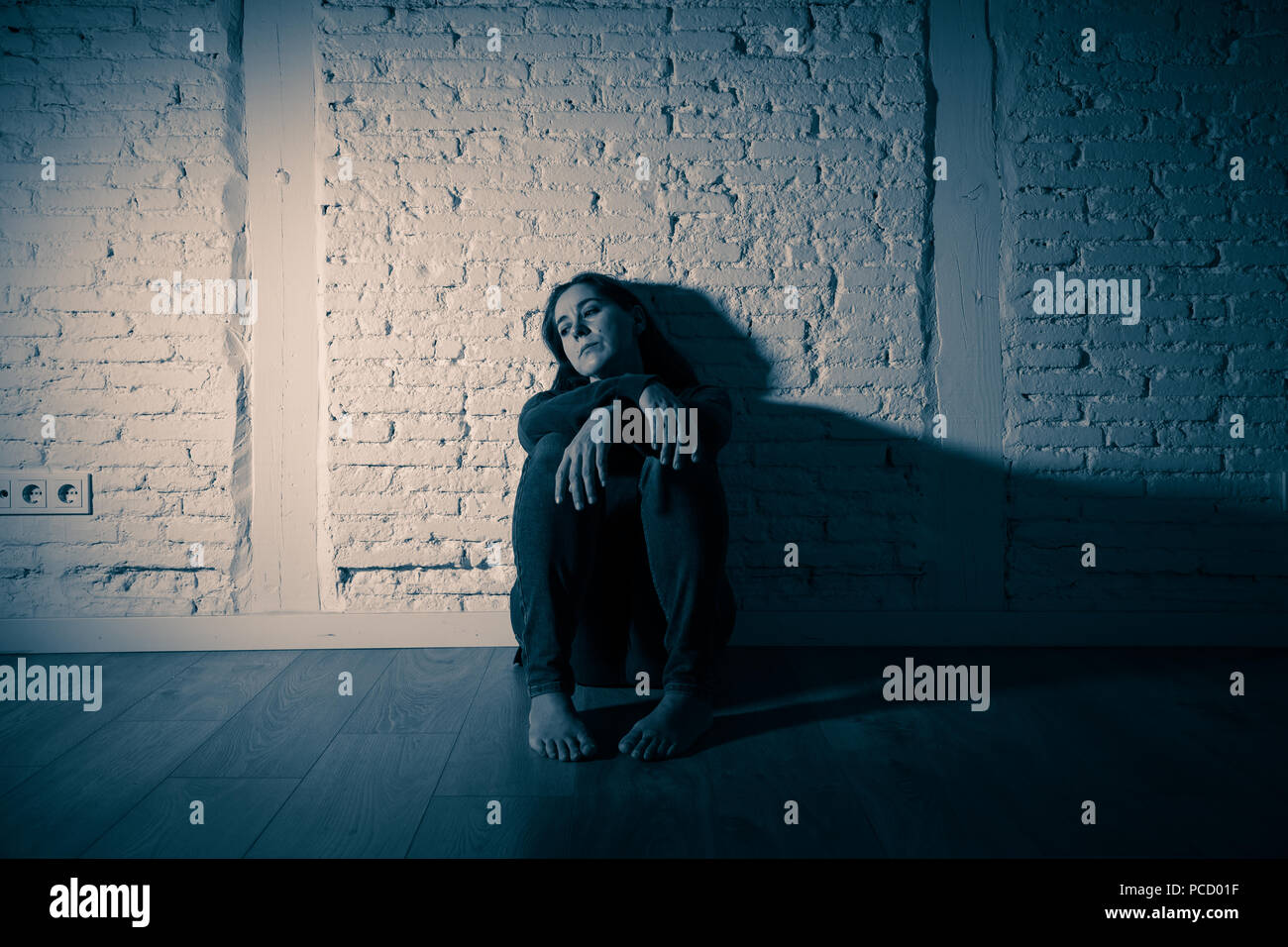 Young devastated depressed woman crying sad feeling hurt suffering ...