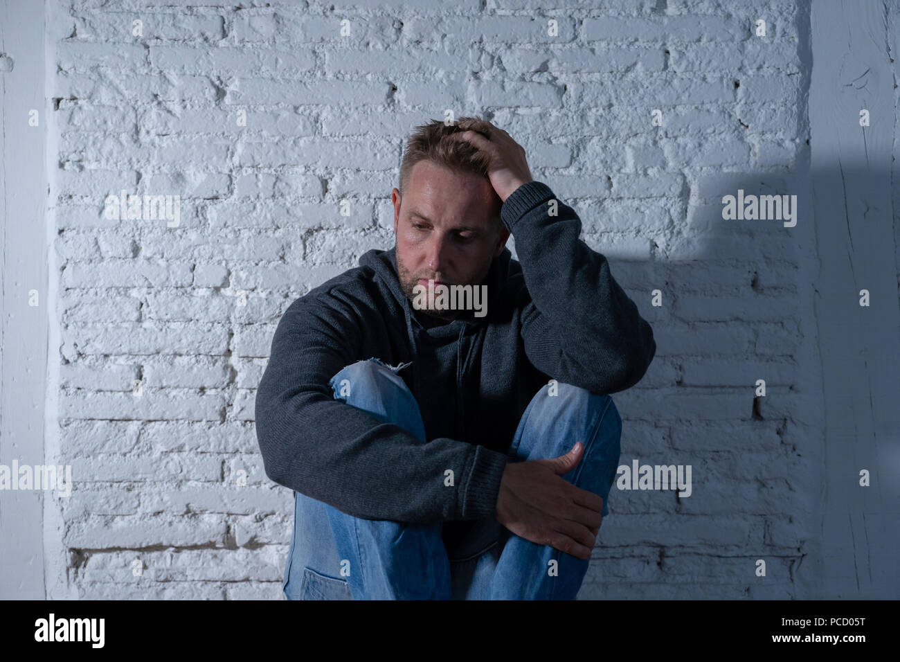 Young devastated depressed woman crying sad feeling hurt suffering ...