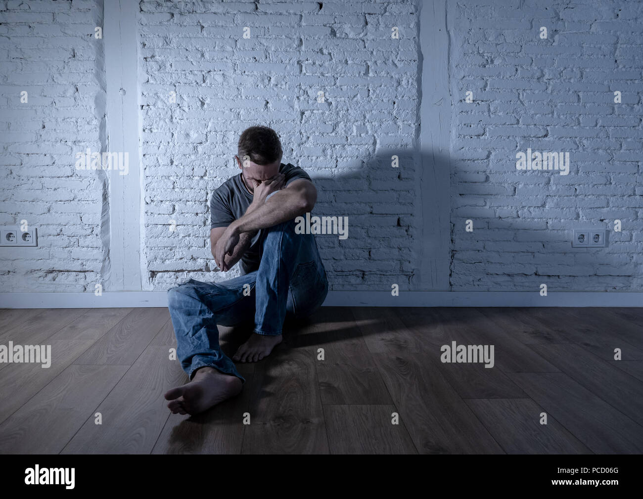 Young devastated depressed woman crying sad feeling hurt suffering ...