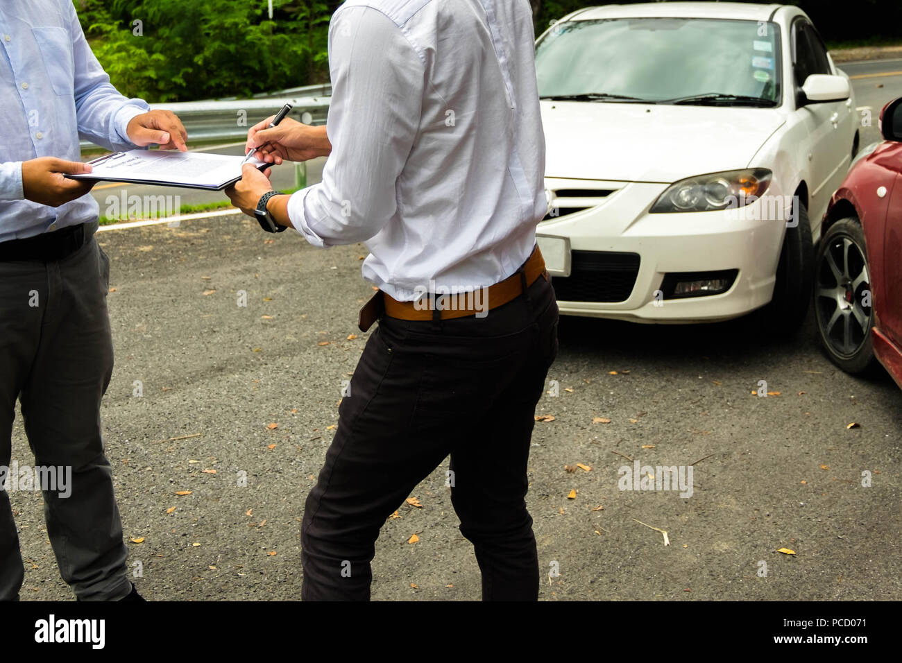 The insurance agent working claim process in payment on from parties ...