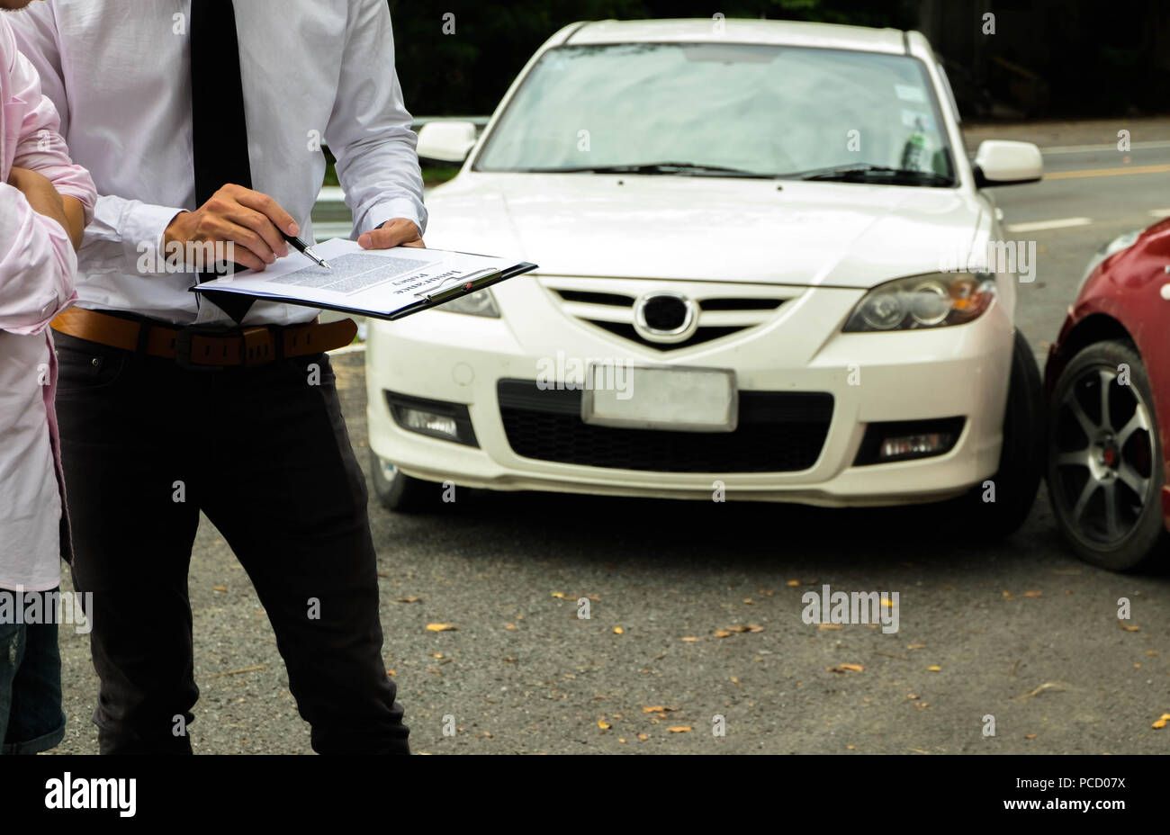 The insurance agent working claim process in payment on from parties ...