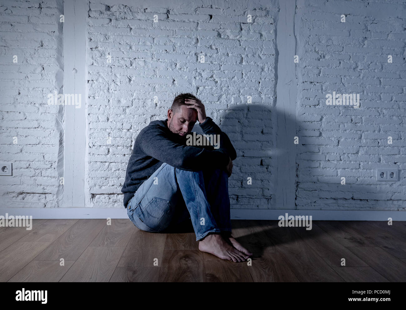 Young devastated depressed woman crying sad feeling hurt suffering ...