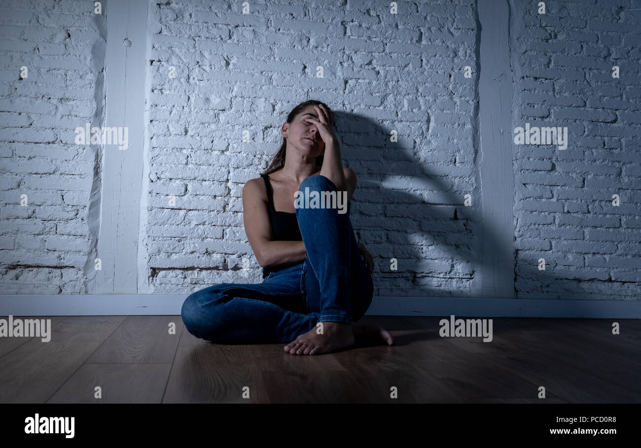 Young devastated depressed woman crying sad feeling hurt suffering ...