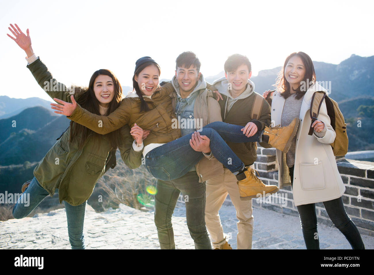 Portrait of happy young Chinese friends on the Great Wall Stock Photo ...
