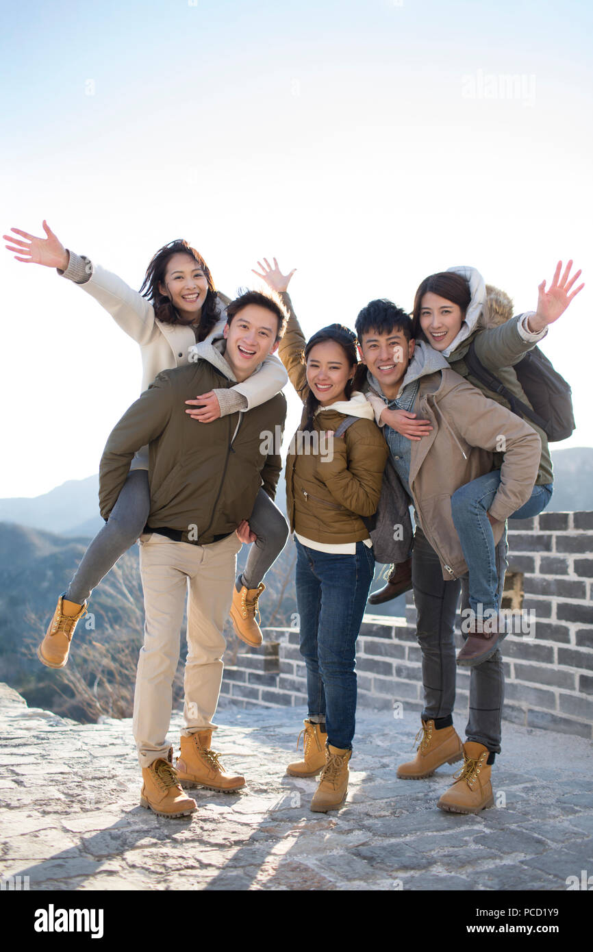 Portrait of happy young Chinese friends on the Great Wall Stock Photo ...