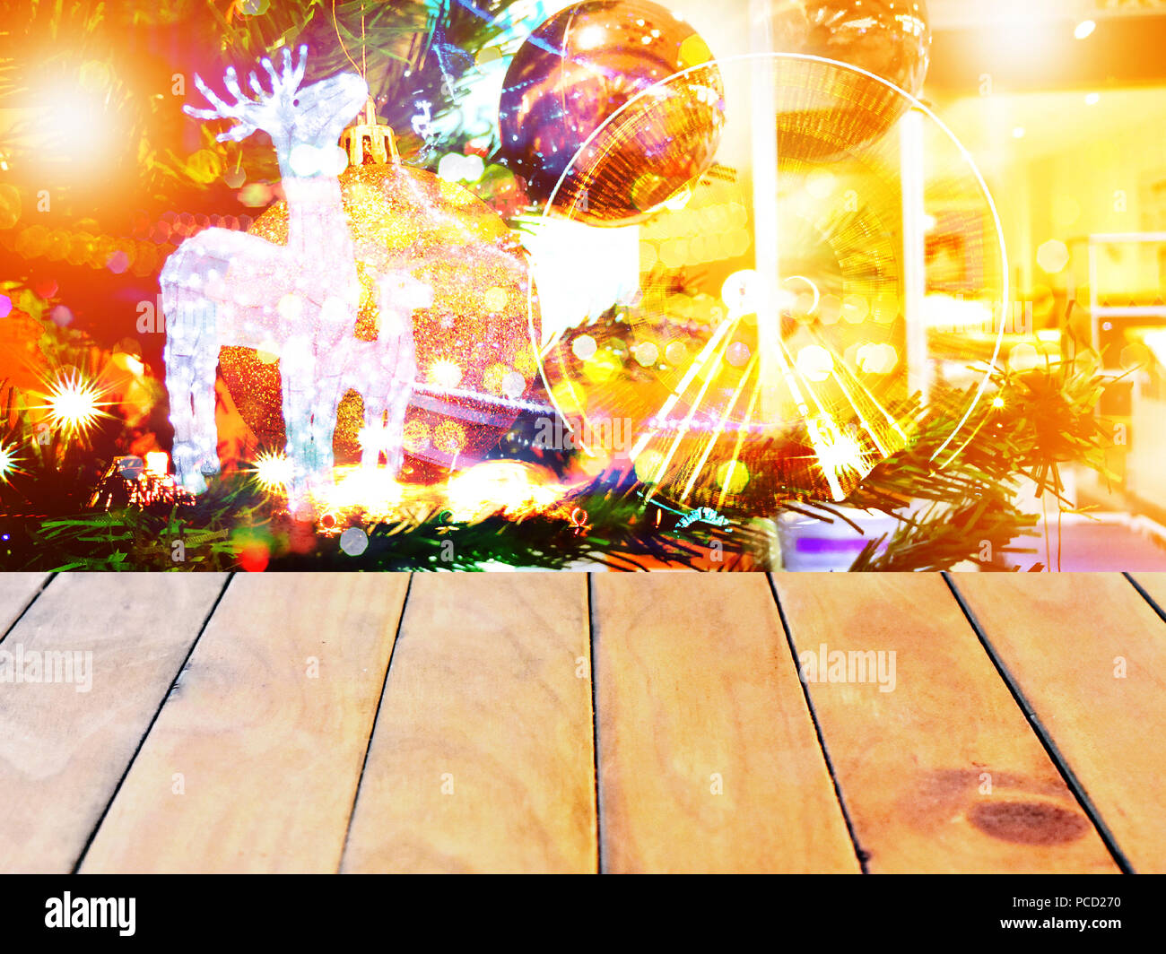 Wooded table and beautiful background montage Stock Photo - Alamy