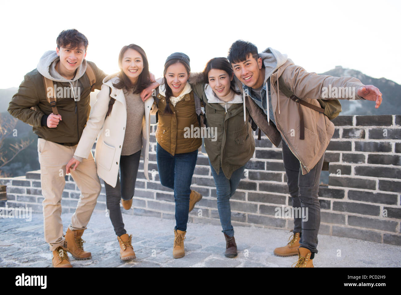 Portrait of happy young Chinese friends on the Great Wall Stock Photo ...
