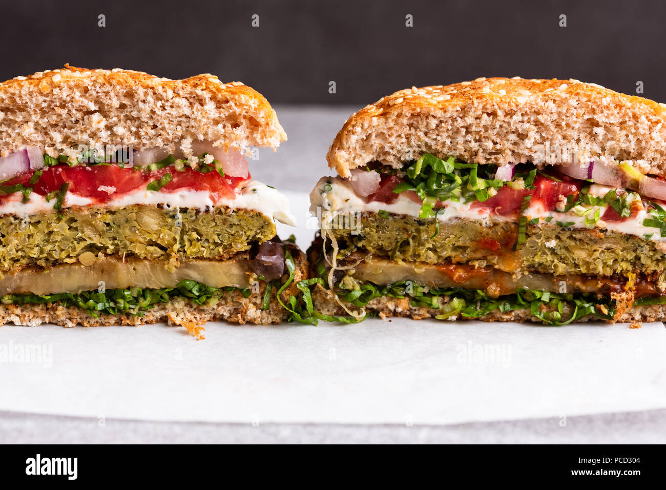 Cut in half vegetarian Burger Stock Photo - Alamy