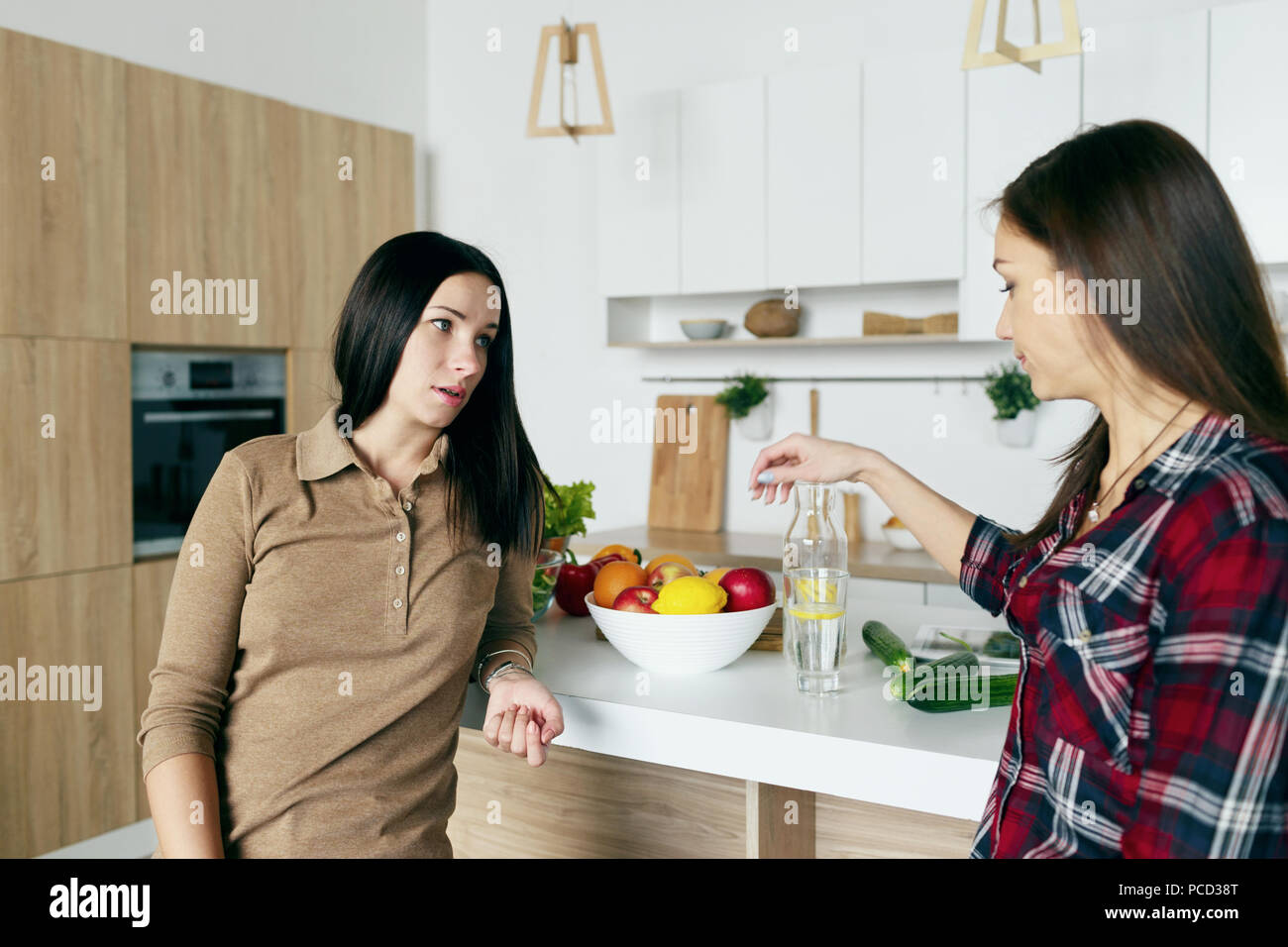 Two friends talking serious hi-res stock photography and images - Alamy