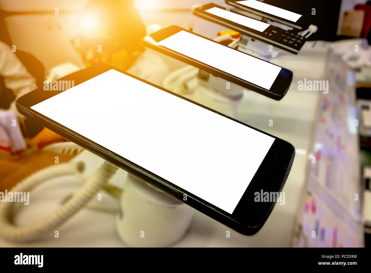 Smart phone is placed in the phone store,Four smart phone on table ...