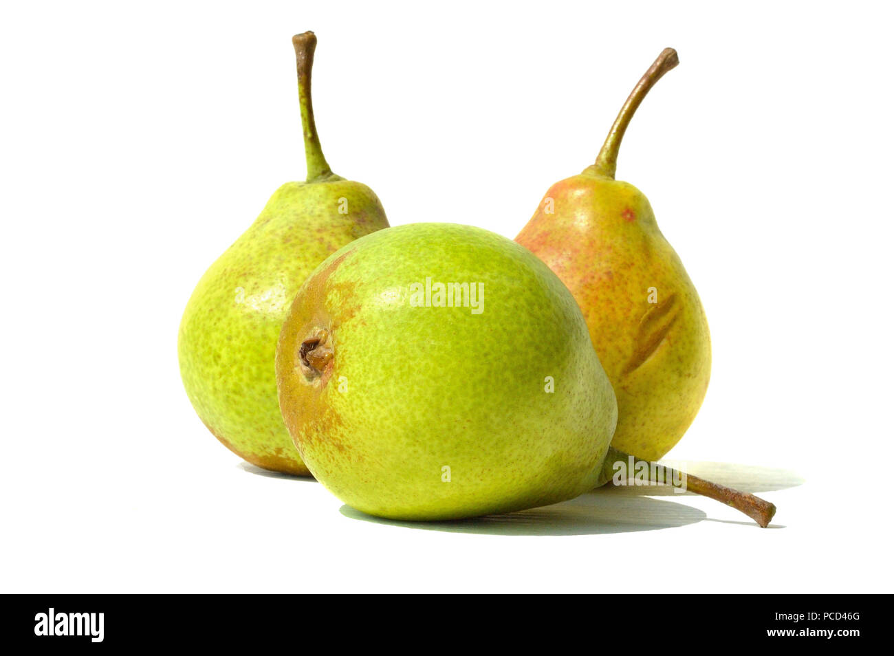 Group of pears on white background Stock Photo - Alamy