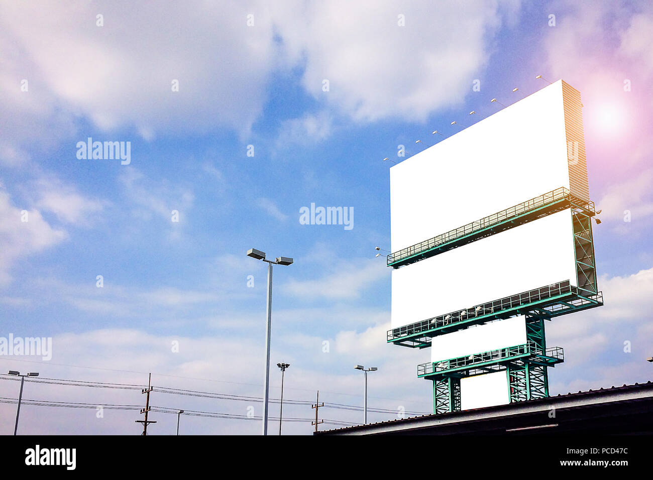 Big billboard on the roof of supermarket Stock Photo - Alamy