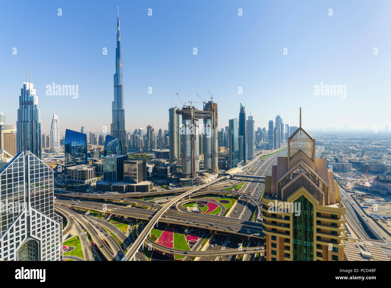 Dubai skyline and Sheikh Zayed Road Interchange, Dubai, United Arab ...