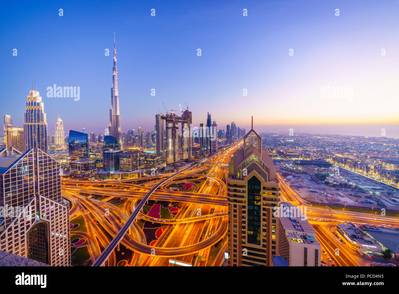 Dubai skyline with Burj Khalifa and Sheikh Zayed Road Interchange ...