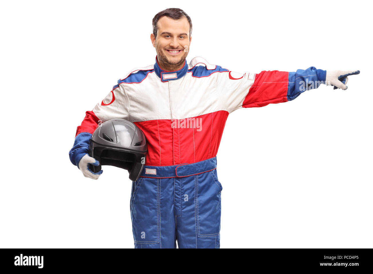 Race driver holding a helmet and pointing isolated on white background ...