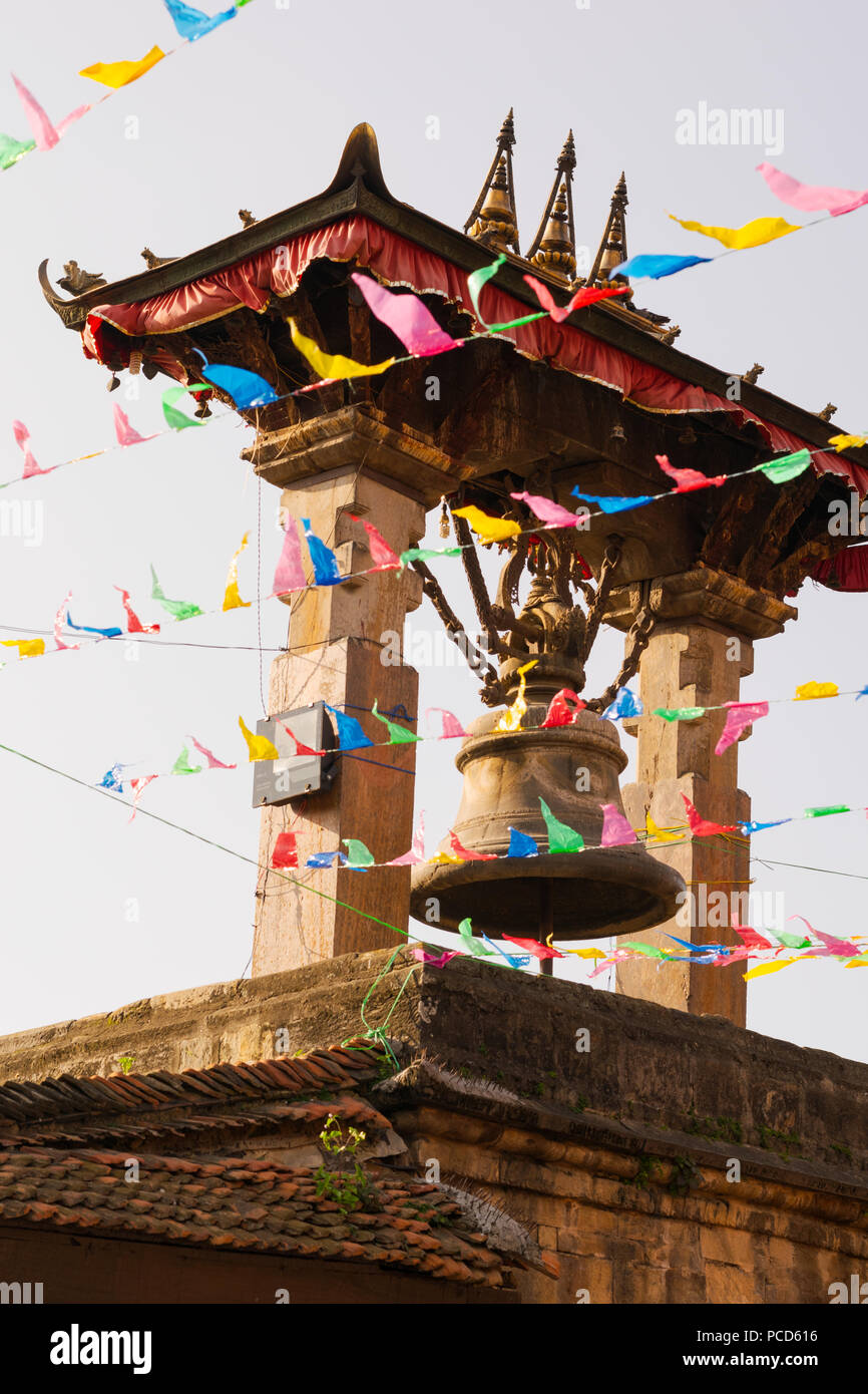 Prayer flags and decorations are held over Patan Durbar Square in ...