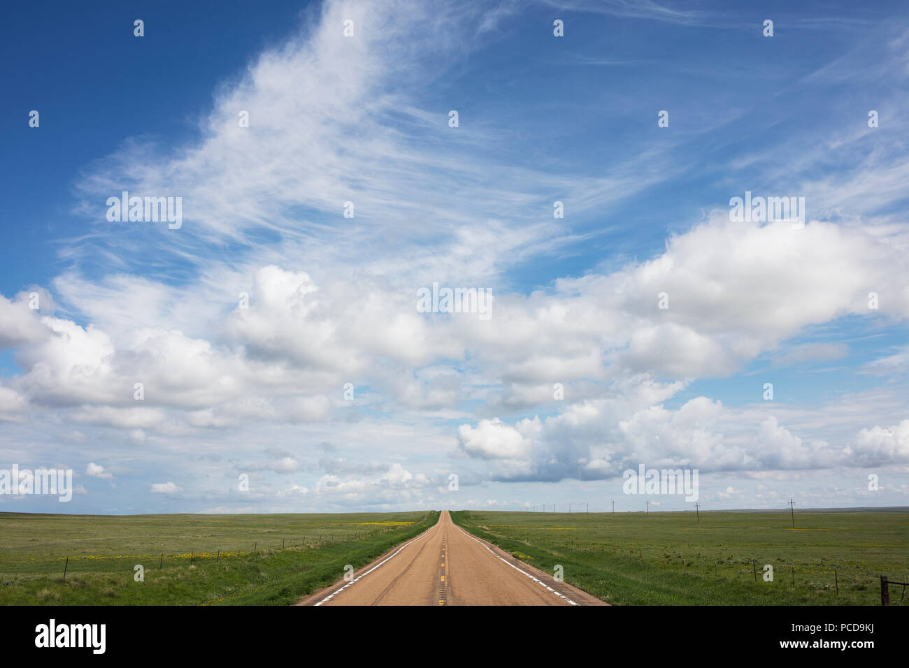 Open road through vast prairie and farmland, Saskatchewan, Canada Stock ...
