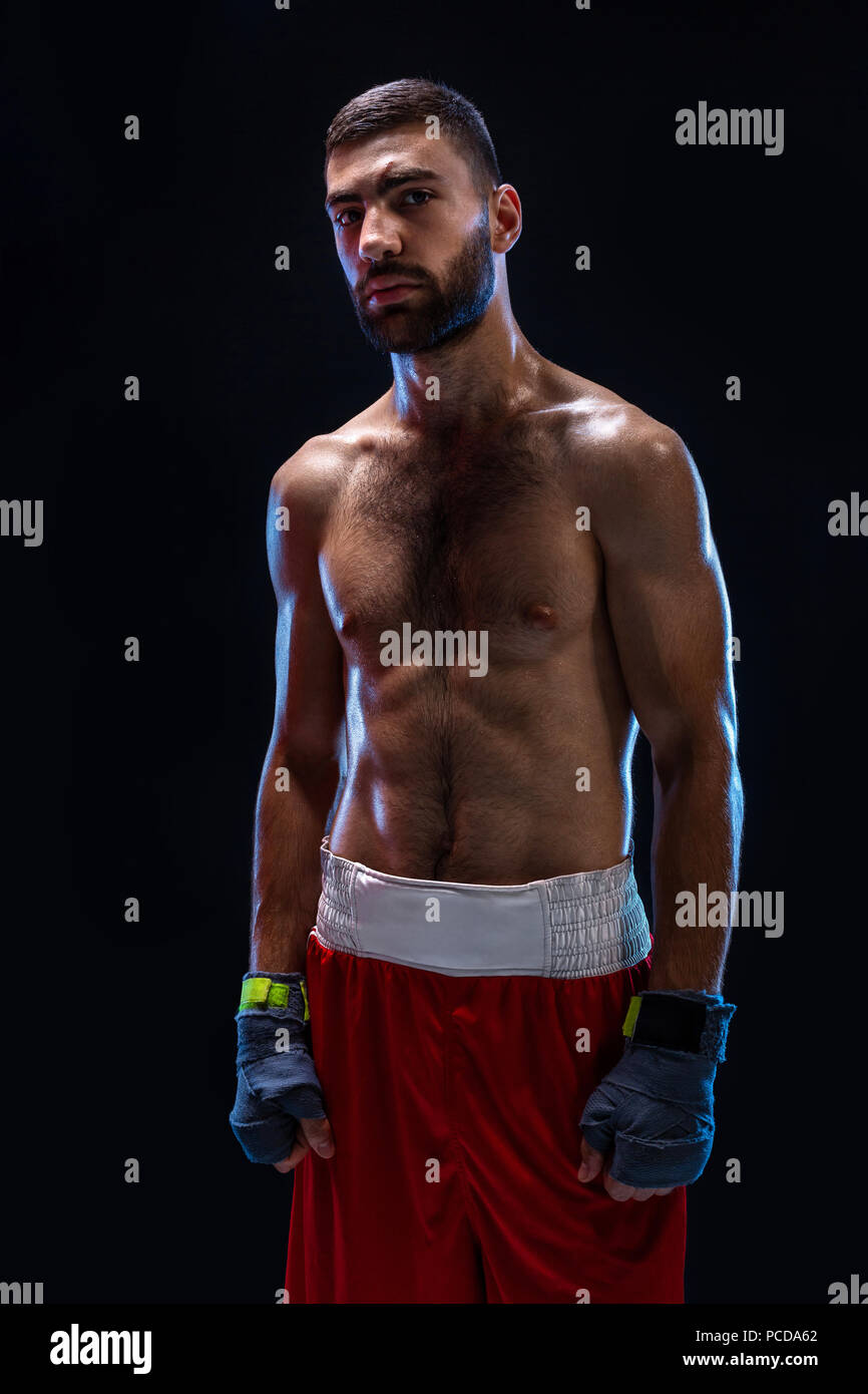 Boxing man ready to fight. Boxer with strong hands and clenched fists ...