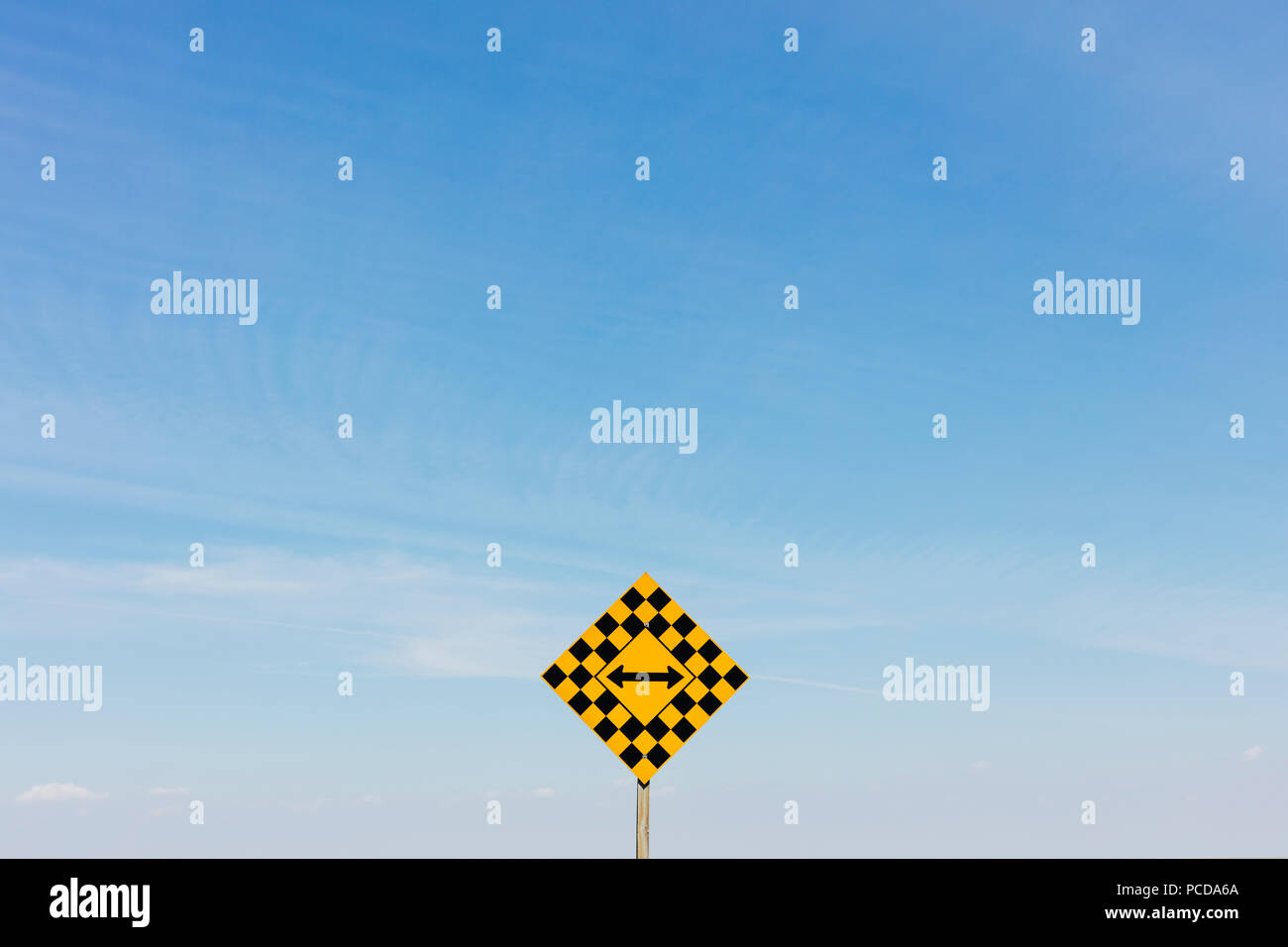 Arrow intersection sign Stock Photo - Alamy