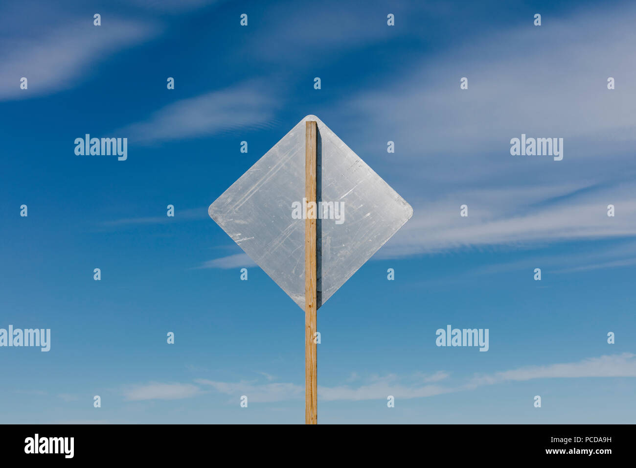Blank side of a road sign, blue sky in background Stock Photo - Alamy