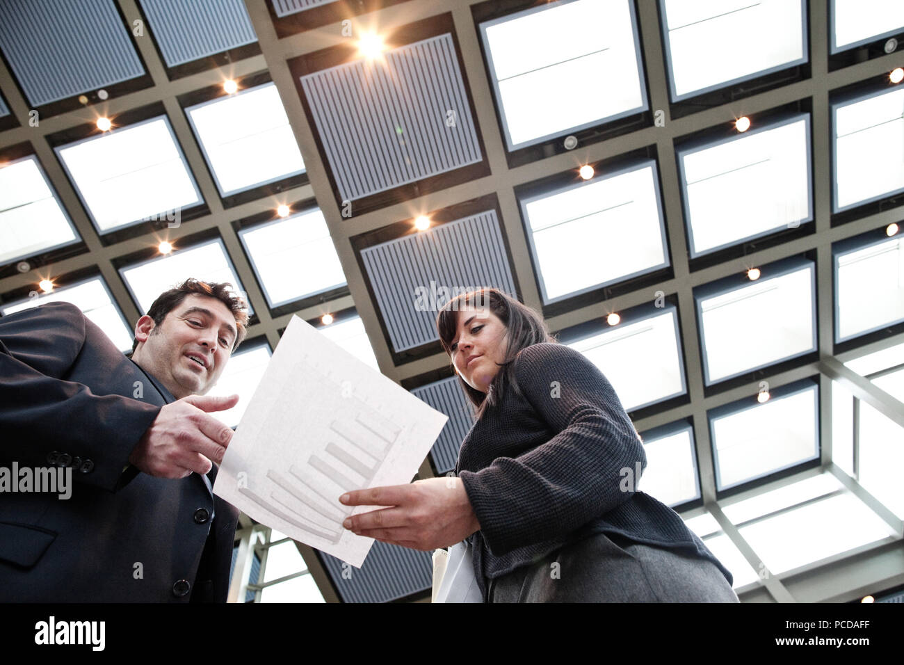 Businessman going over paperwork hi-res stock photography and images ...