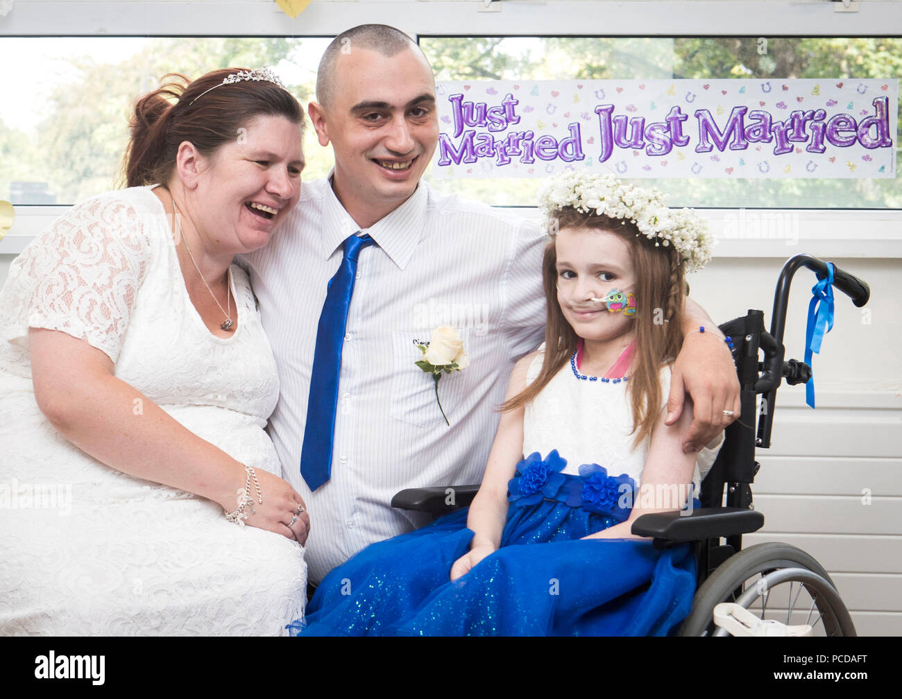 Cancer patient Kayleigh Walsh (right) with her parents Lyndsey and Paul ...