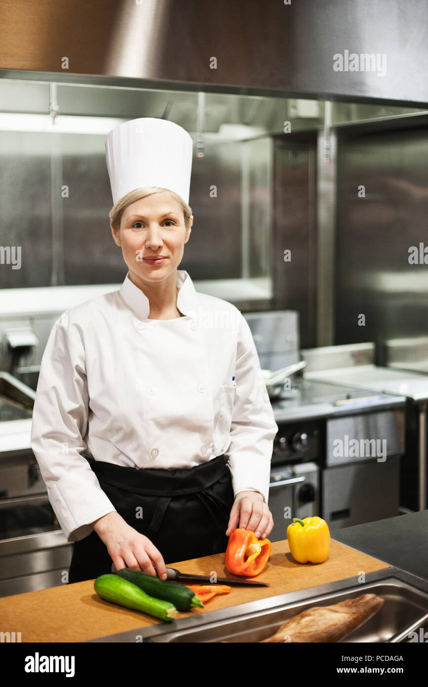 A portrait of a caucasian female chef in a commercial kithchen Stock ...