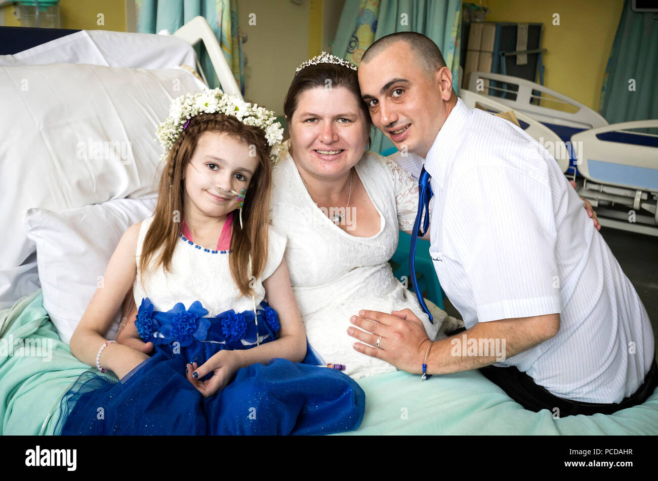 Cancer patient Kayleigh Walsh (left) with her parents Lyndsey and Paul ...