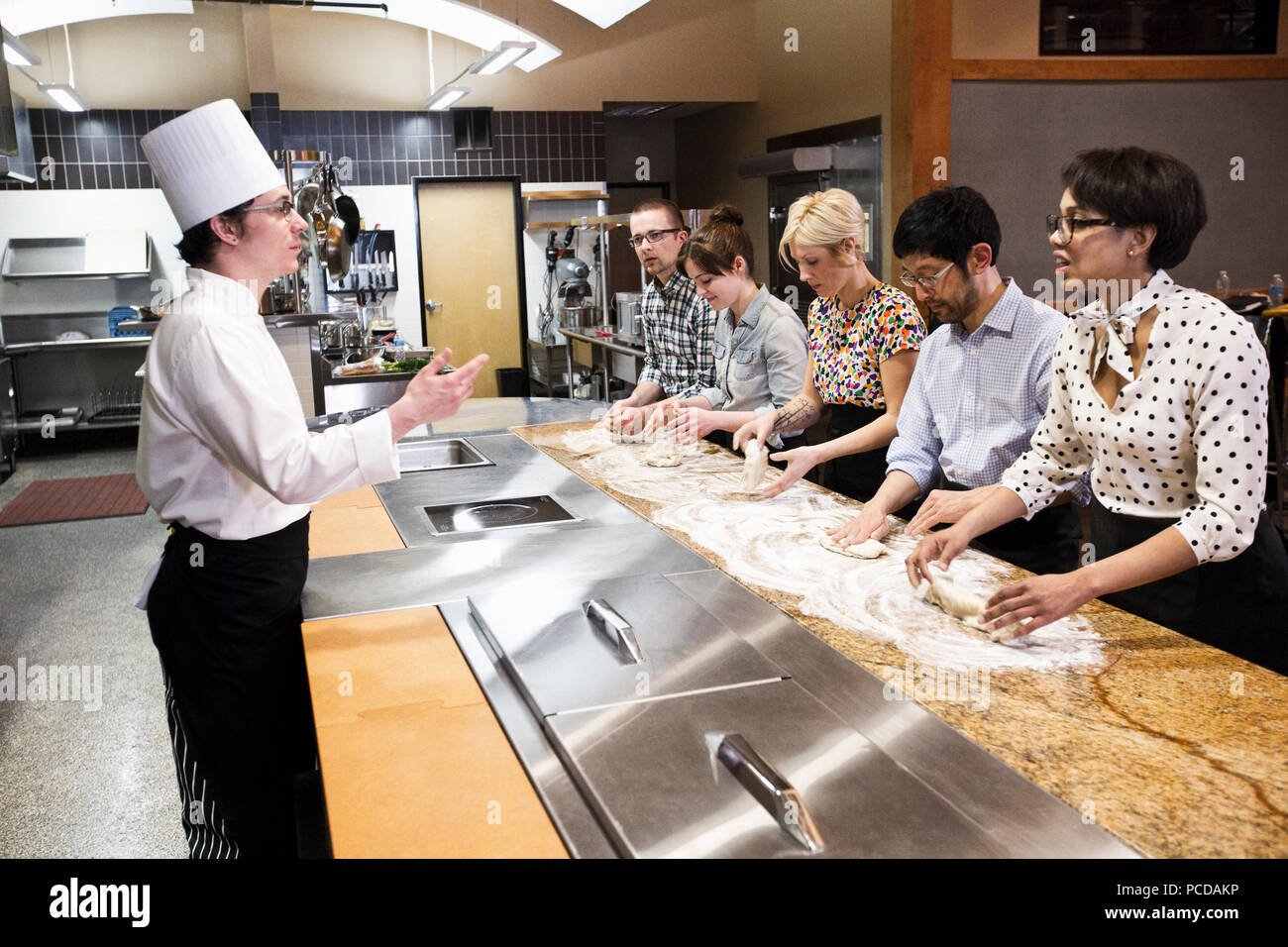 Chef teaching students asian hi-res stock photography and images - Alamy