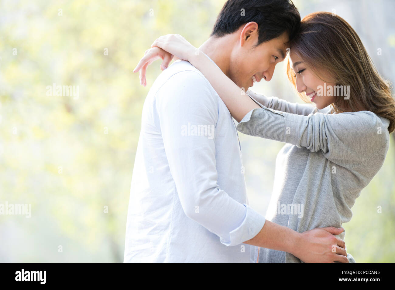 Happy young Chinese couple Stock Photo - Alamy