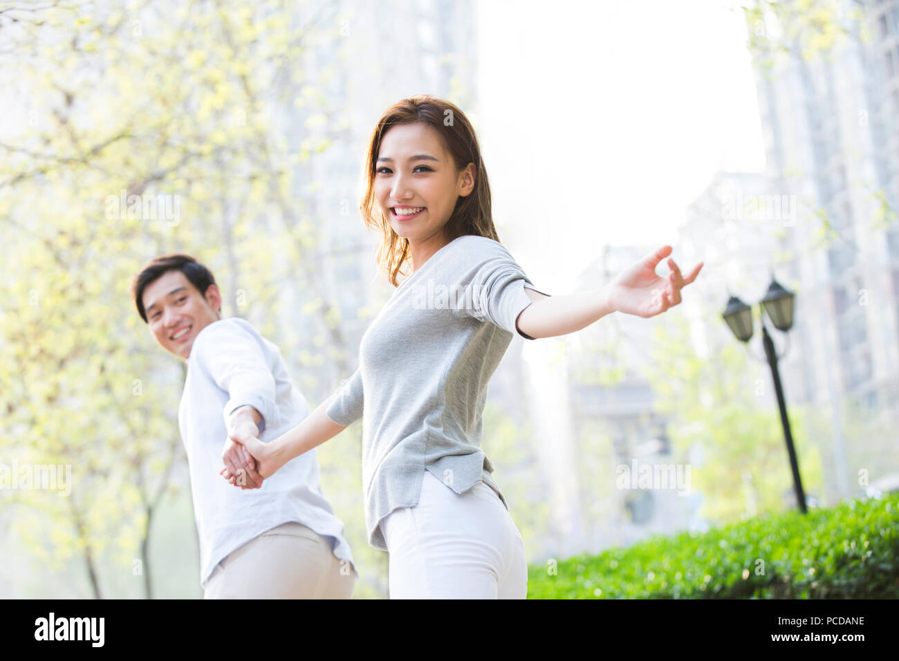 Happy young Chinese couple Stock Photo - Alamy