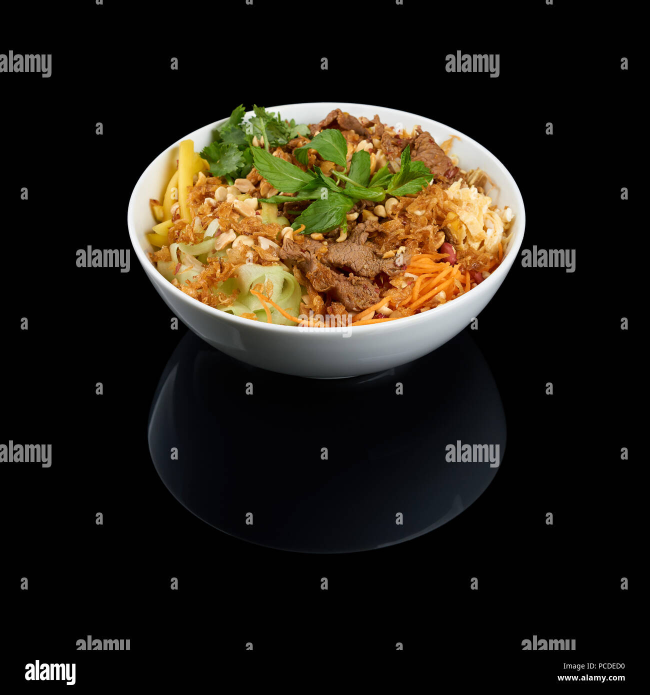 Vietnamese Fo Chon on black reflecting background Stock Photo - Alamy