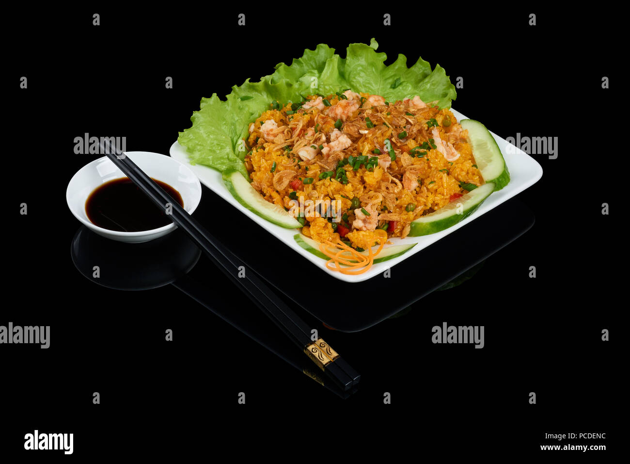 Vietnamese dish fried rice on black reflective background Stock Photo ...