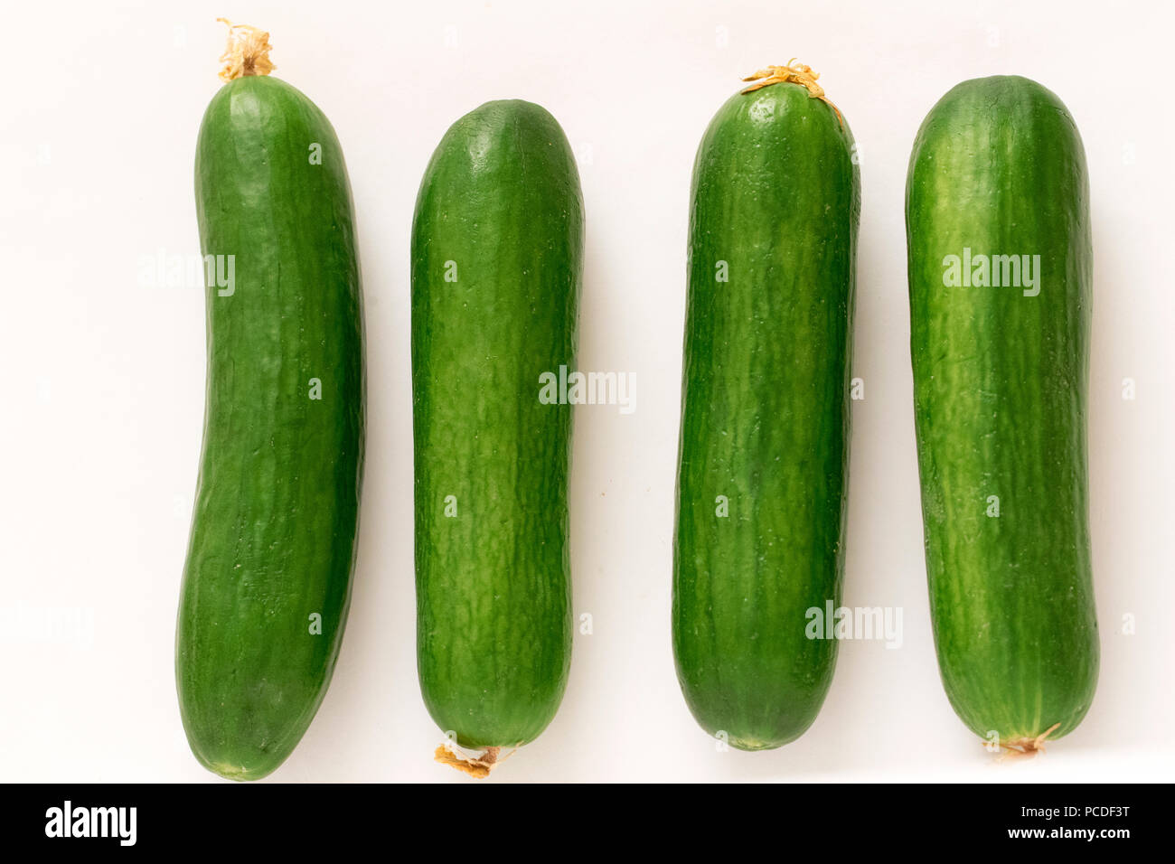 Four cucumbers hi-res stock photography and images - Alamy
